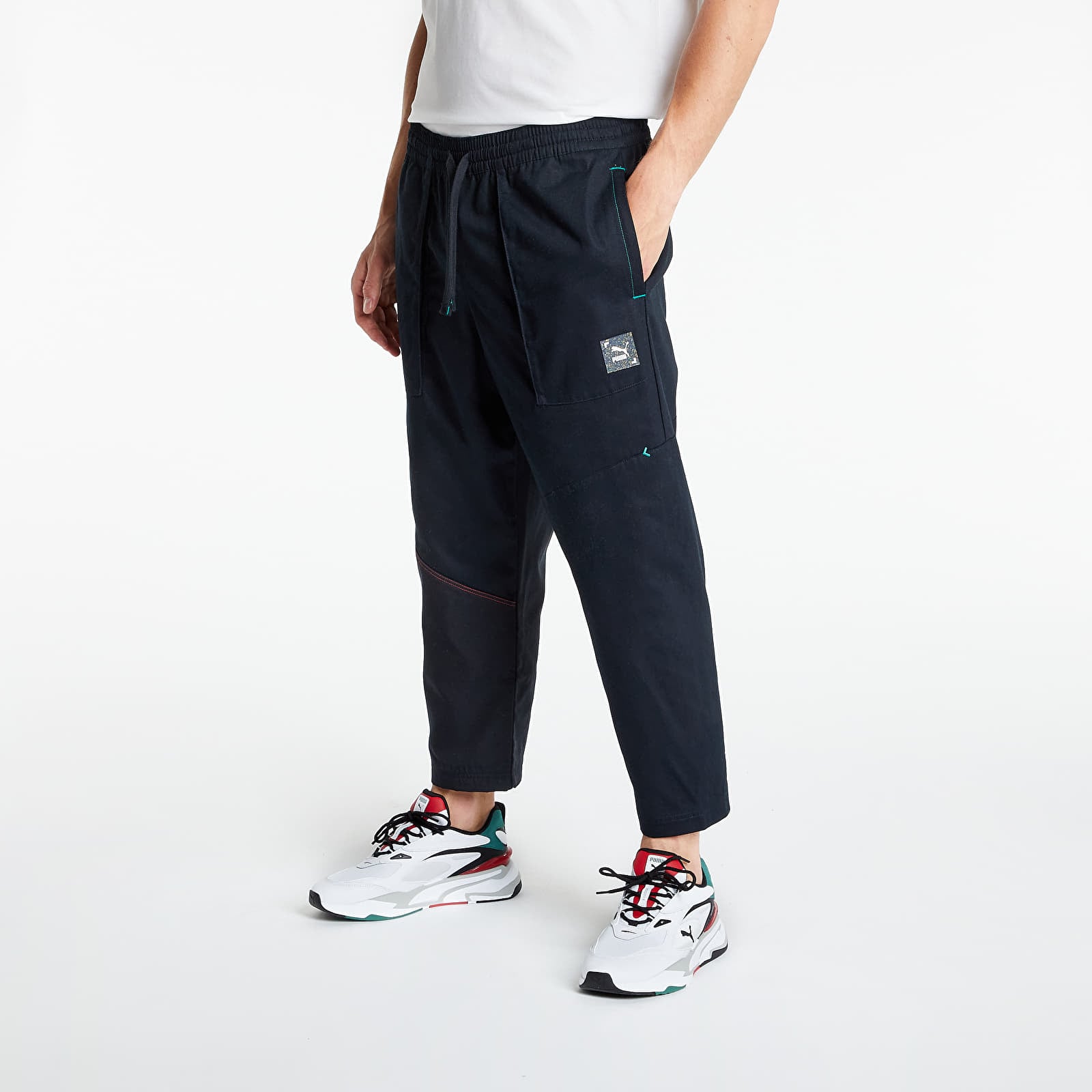Pants and jeans Puma RE.GEN Woven Pants Anthracite | Footshop